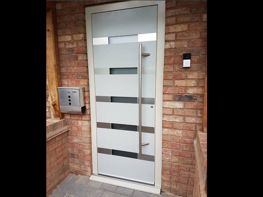 Custom built aluminium front doors. Ultimate insulation & performance.