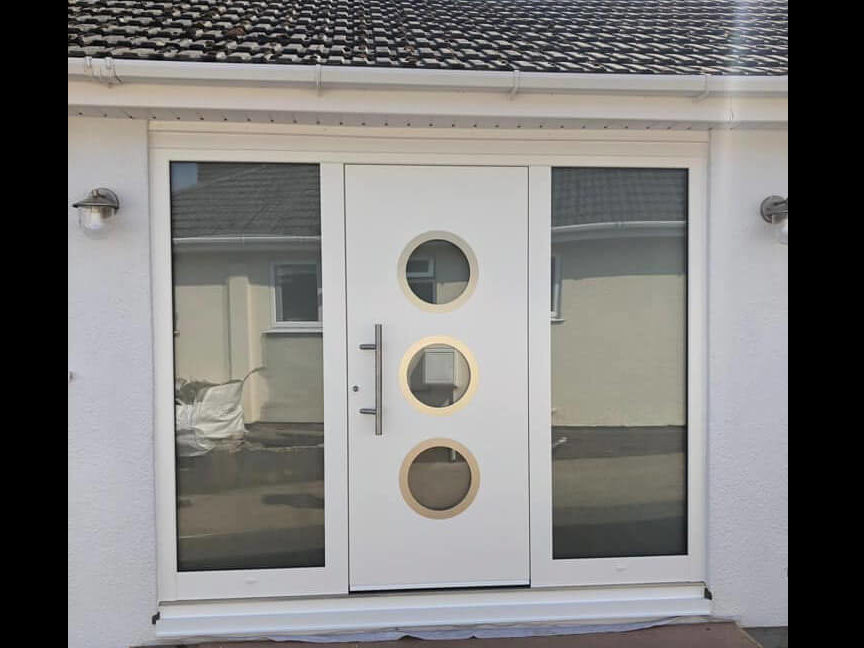 Custom built aluminium front doors for ultimate insulation.