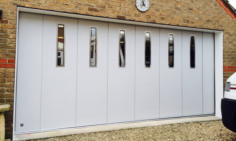 Side-sliding are the most original garage door designs in UK.